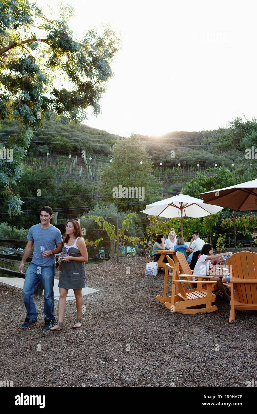 USA, California, Malibu, people dine and drink wine in the Malibu Hills ...