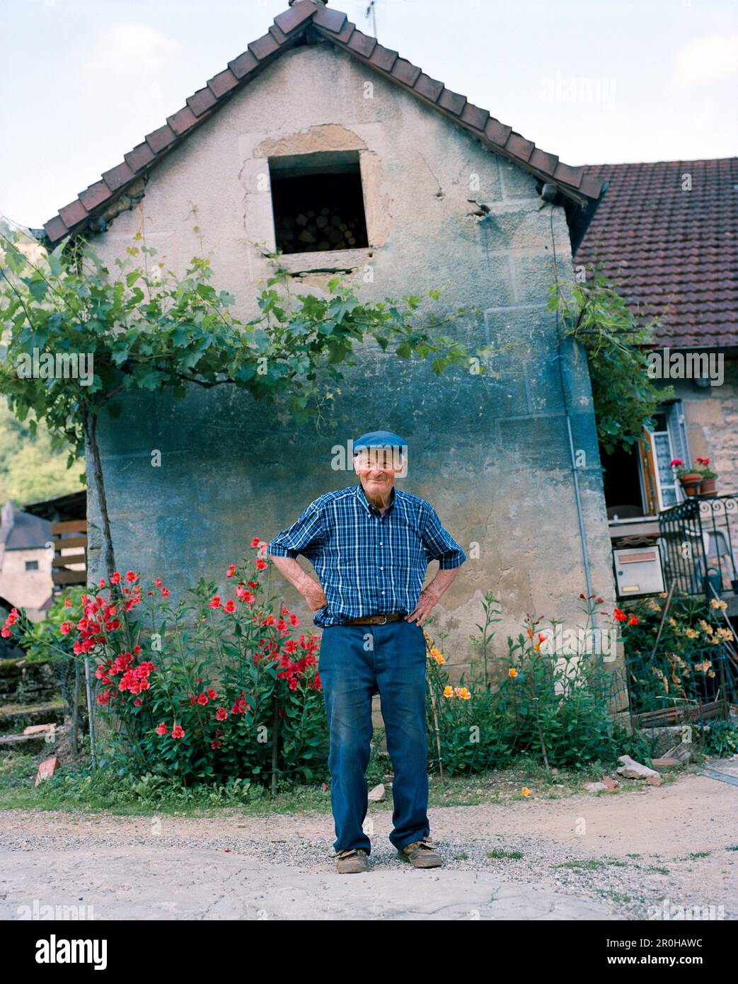 FRANCE, Baume les Messieurs, a local Frenchman in front of his home in ...