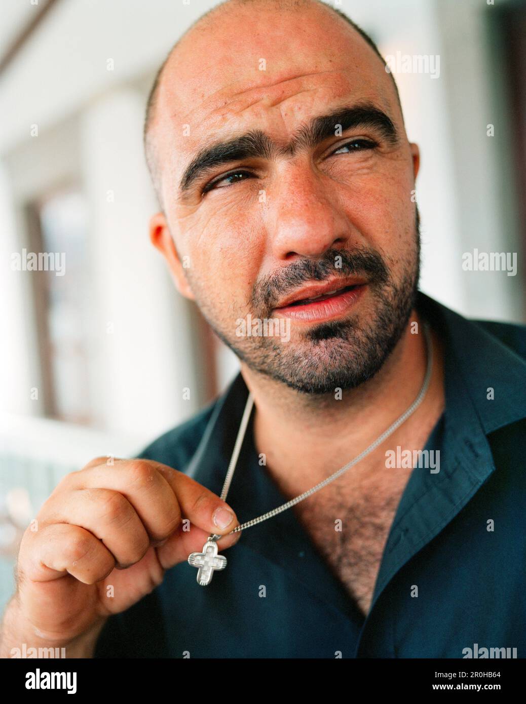 GREECE, Patmos, Skala, Dodecanese Island, taverna owner and musician ...