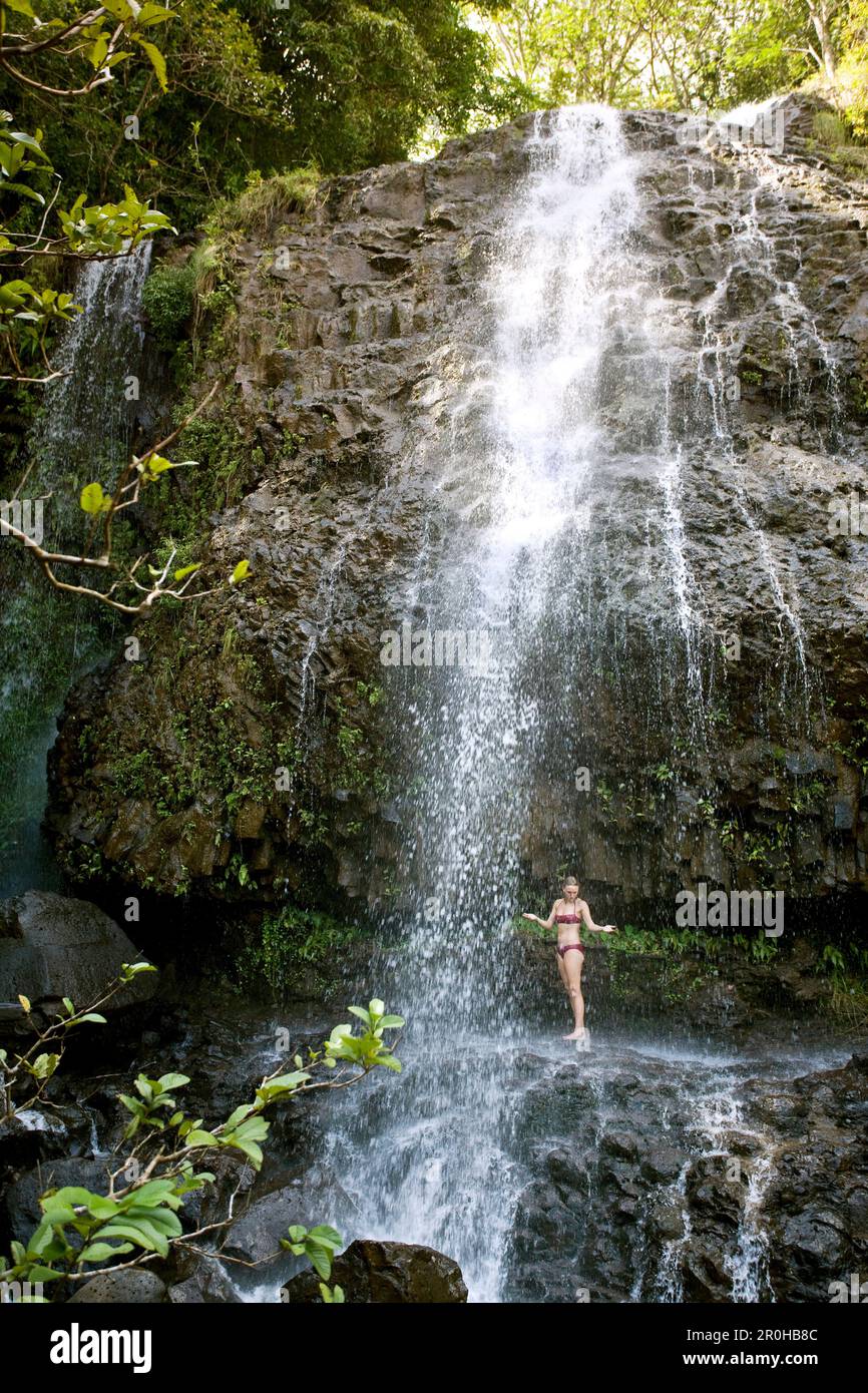 Woman under waterfall hi-res stock photography and images - Alamy