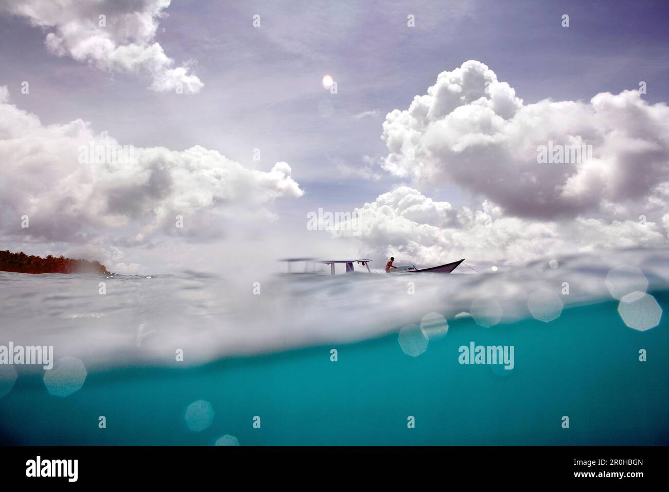 INDONESIA, Mentawai Islands, Kandui Surf Resort, surf boat anchored at ...
