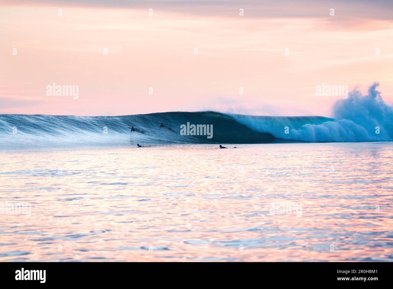 INDONESIA, Mentawai Islands, Kandui Resort, surfing Bankvaults at dusk ...