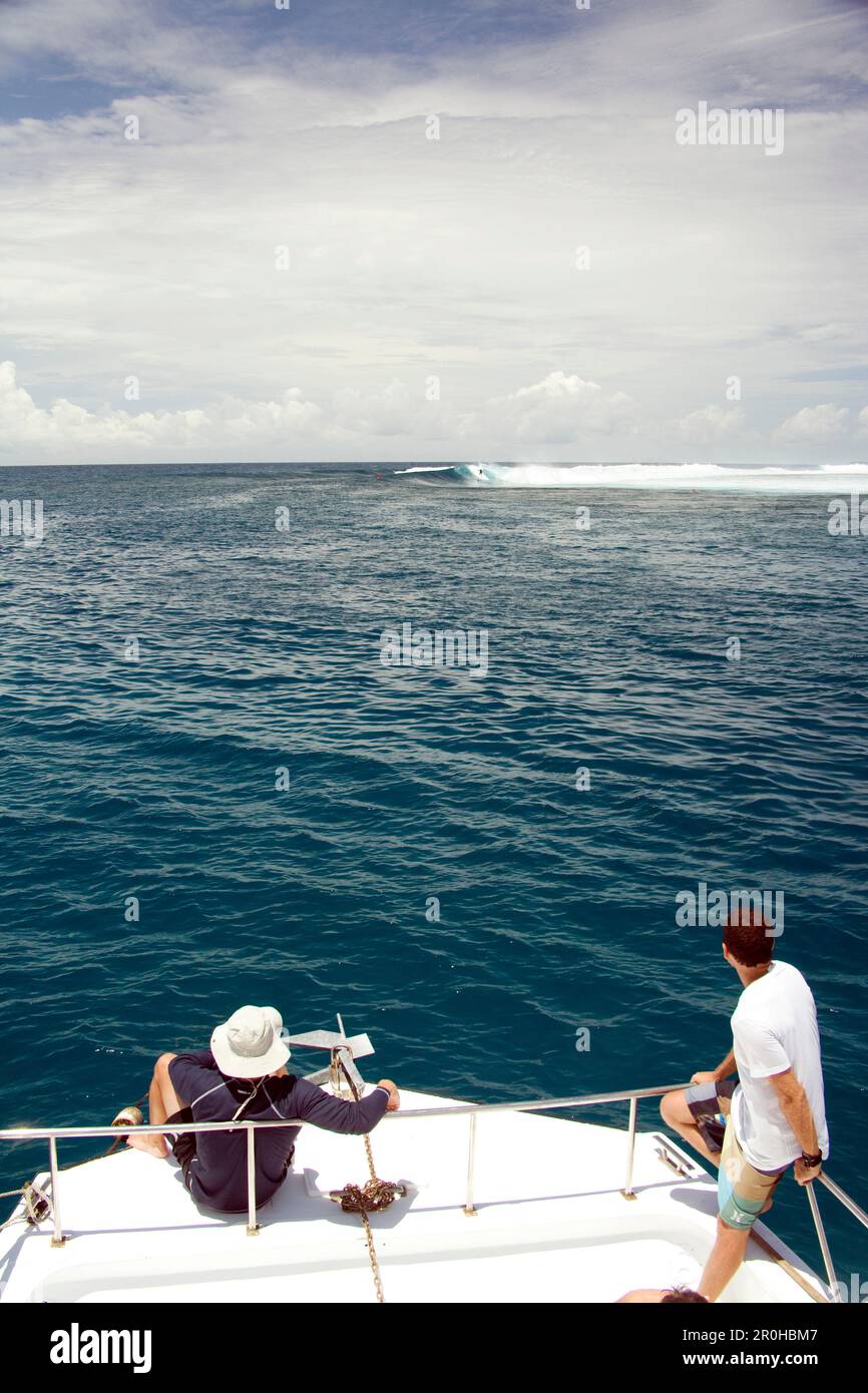INDONESIA, Mentawai Islands, Kandui Resort, watching surfers at ...