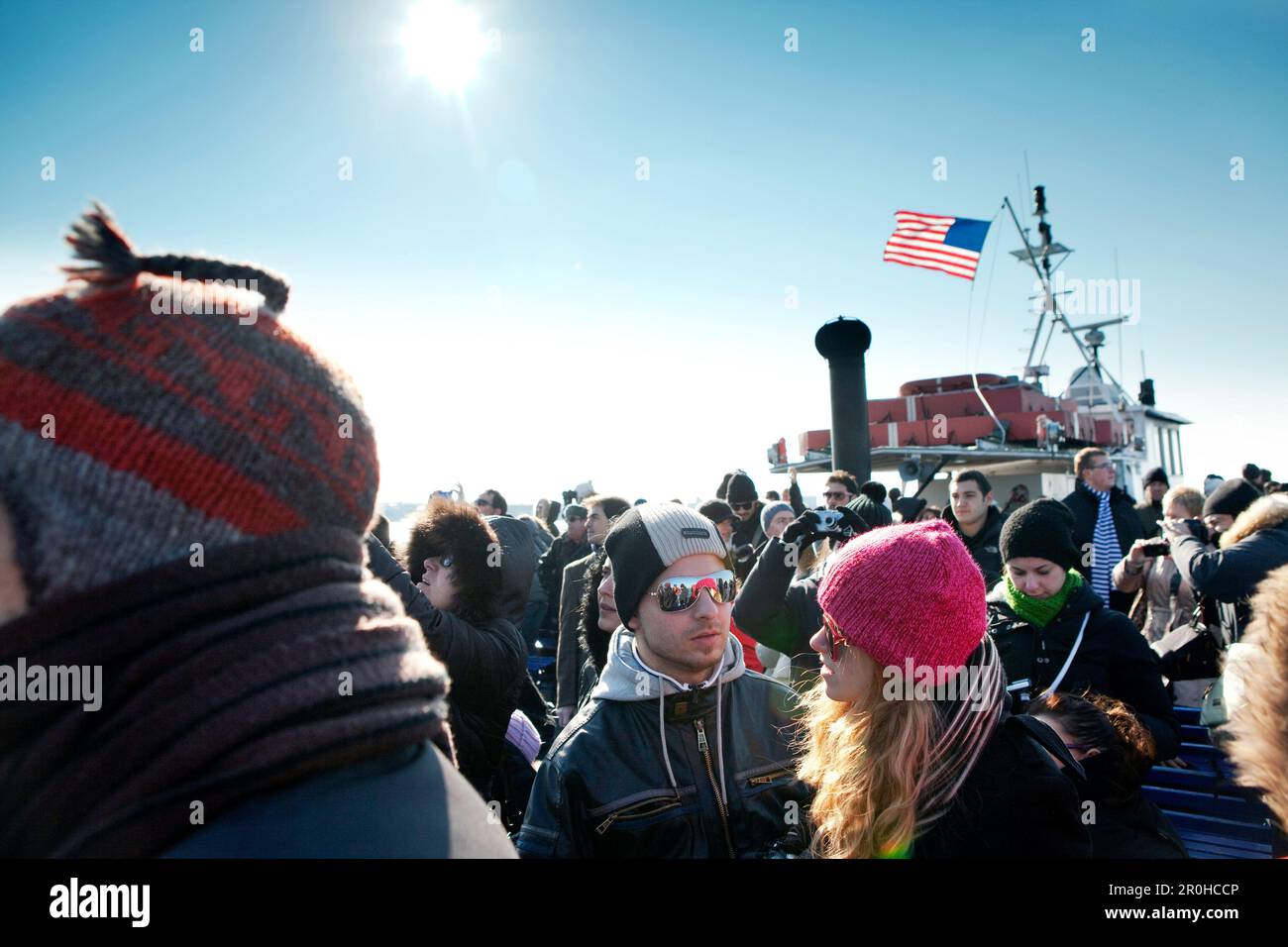 USA, New York, tourists on a boat tour to visit the Statue of Liberty ...