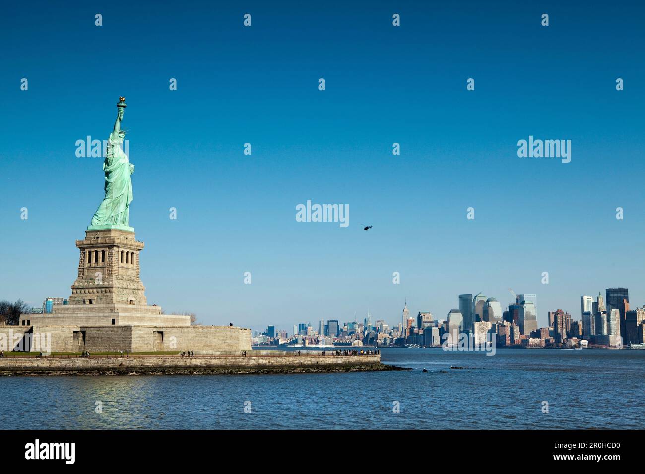 USA, New York, the Statue of Liberty with New York City in the distance ...