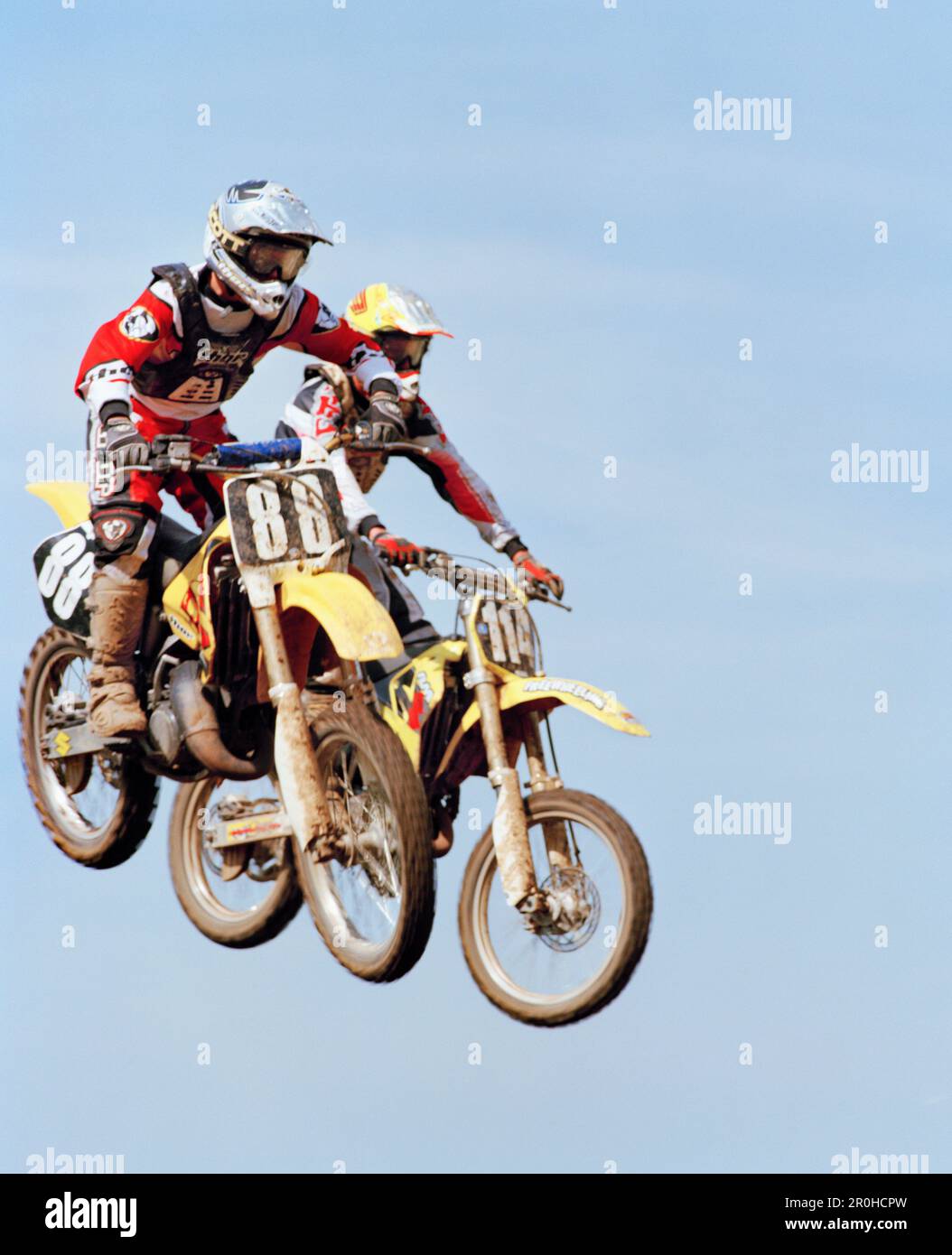 USA, Tennessee, motocross riders getting air and racing for the lead ...