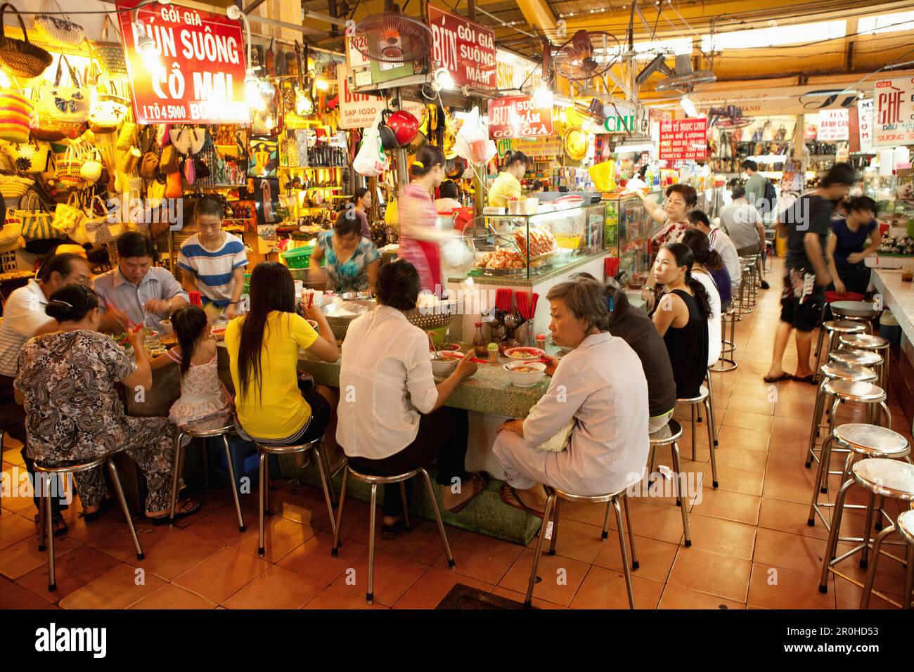 VIETNAM, Saigon, Ben Thanh Market, people dine at one of the many small ...