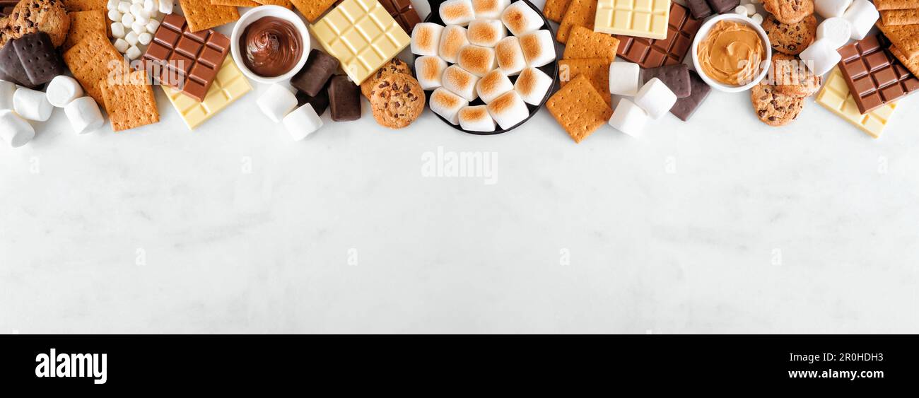 Smores buffet top border. Roasted marshmallows, crackers, chocolate and ...