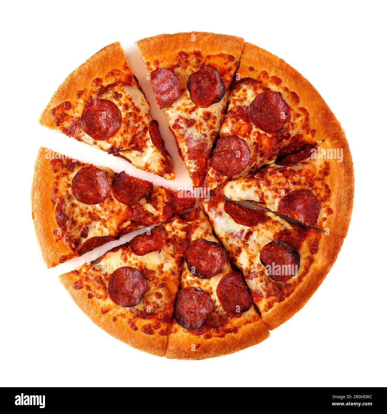 Classic pepperoni pizza with cut slices isolated on a white background ...