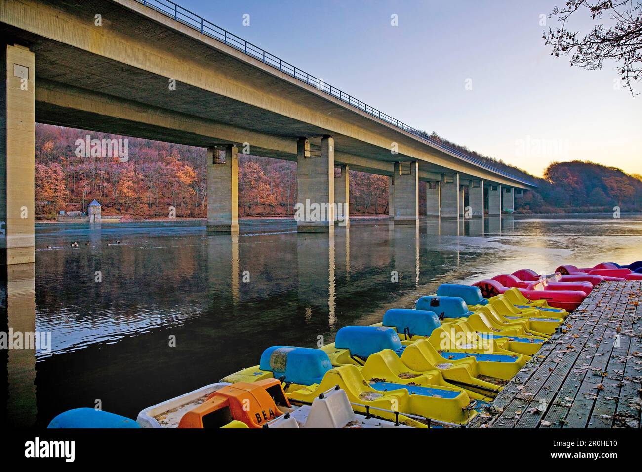 paddleboats and motorway bridge alt lake Seilersee in autum, Germany ...