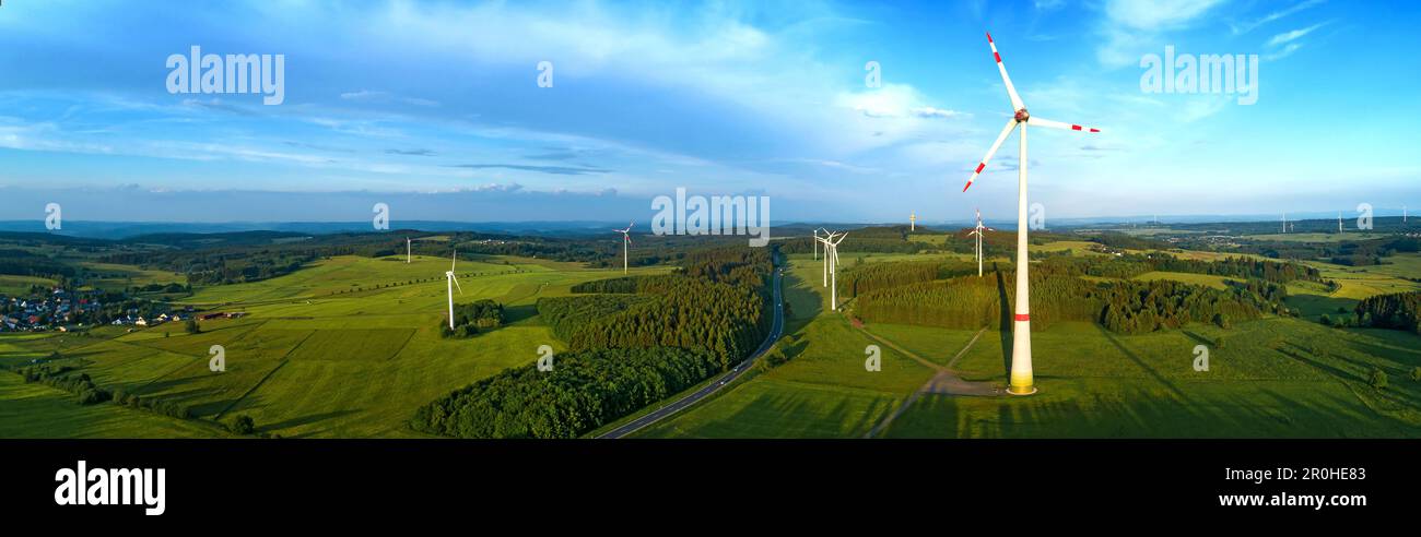 wind wheels in a hilly landscape, Germany Stock Photo - Alamy