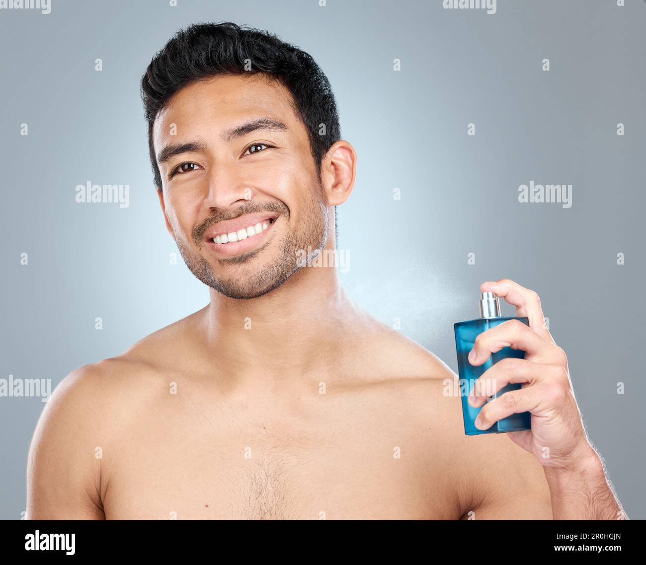 Man applying cologne hi-res stock photography and images - Alamy