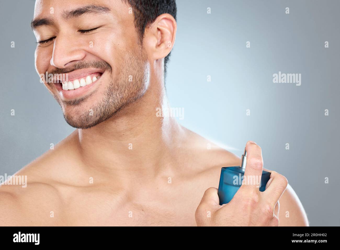 Man applying cologne hi-res stock photography and images - Alamy