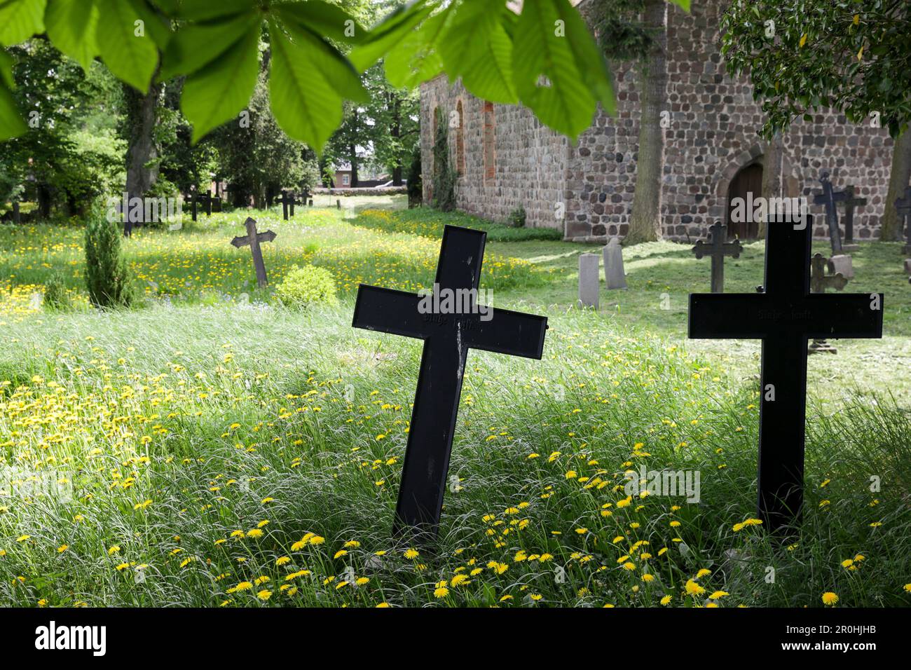 Old graveyard near fieldstone church, Thomsdorf, Boitzenburger Land ...