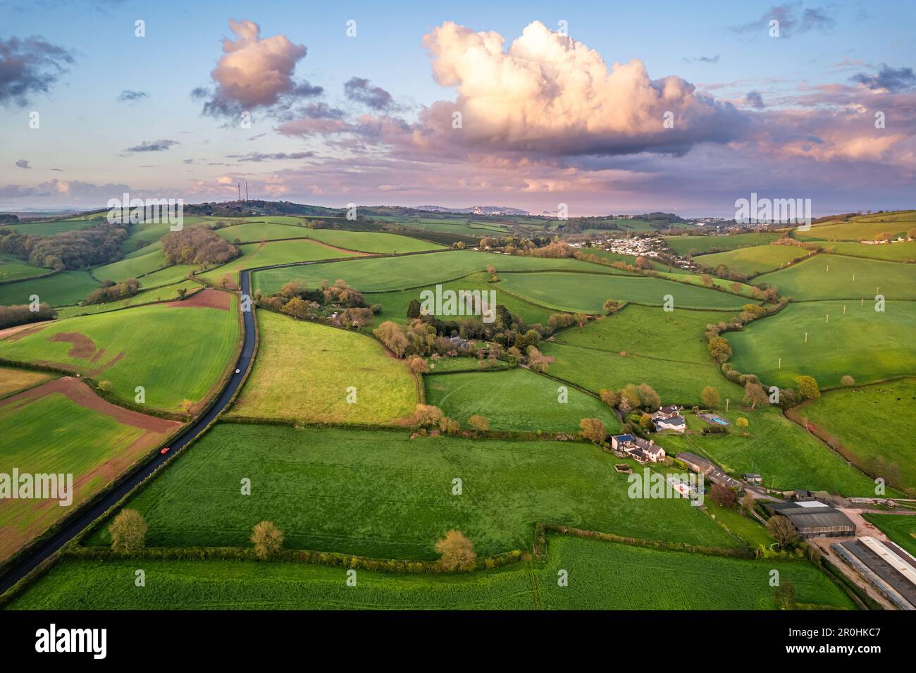 Sunset over Fields and Farmlands in spring from a drone, Devon, England ...
