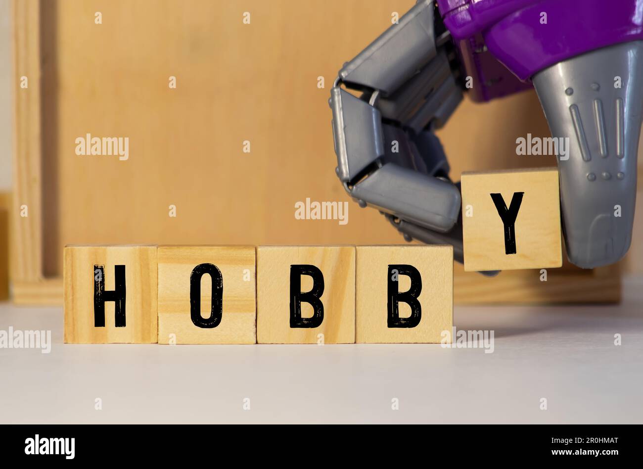 The word HOBBY consists of wooden cubes with letters, top view on a ...