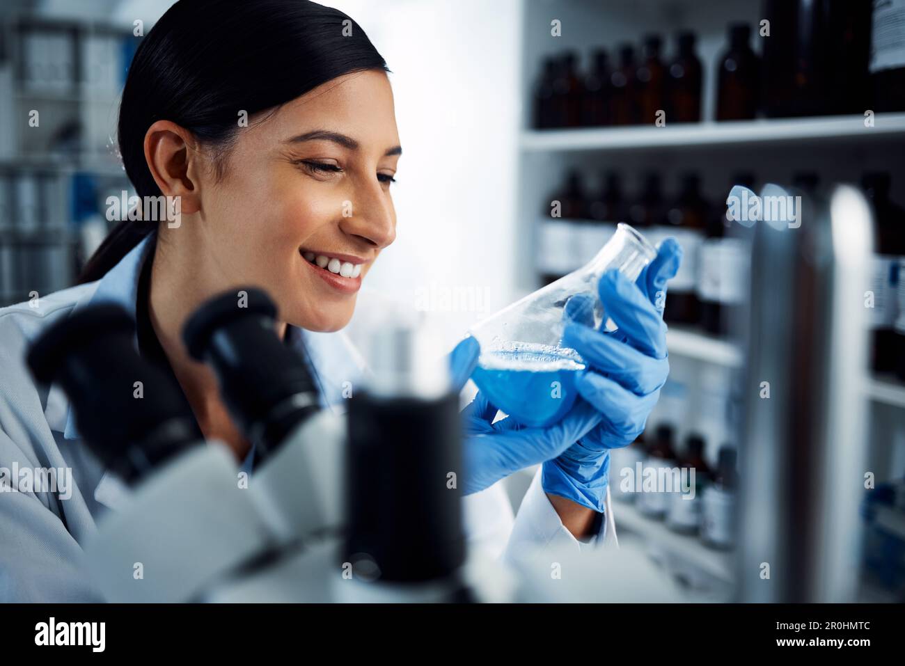 Better health inspired by better medicine. a young scientist conducting ...
