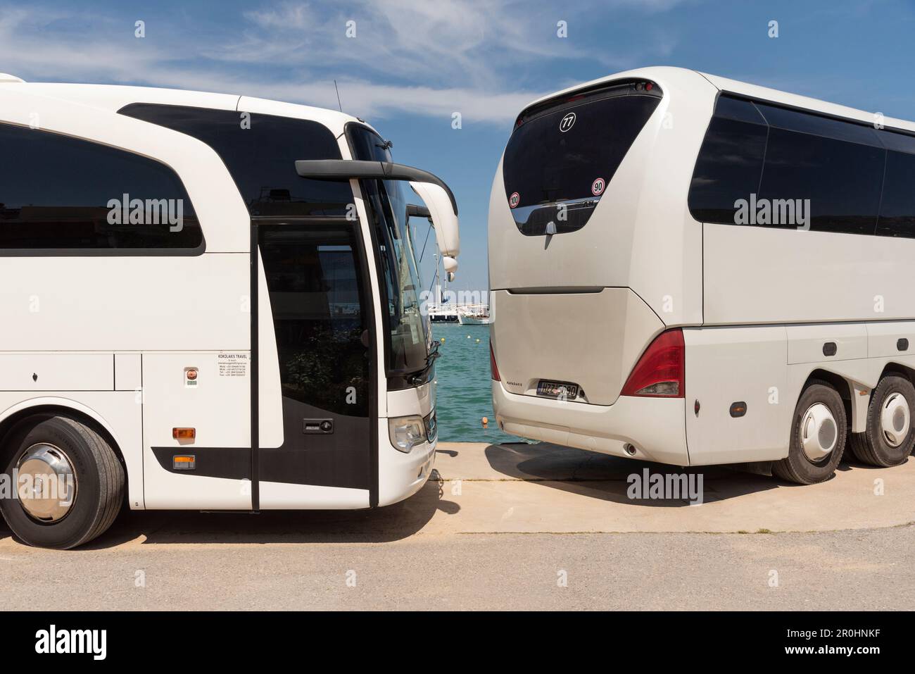 Siteia, Crete, Greece, EU. 2023. Front and rear of holiday tour buses ...