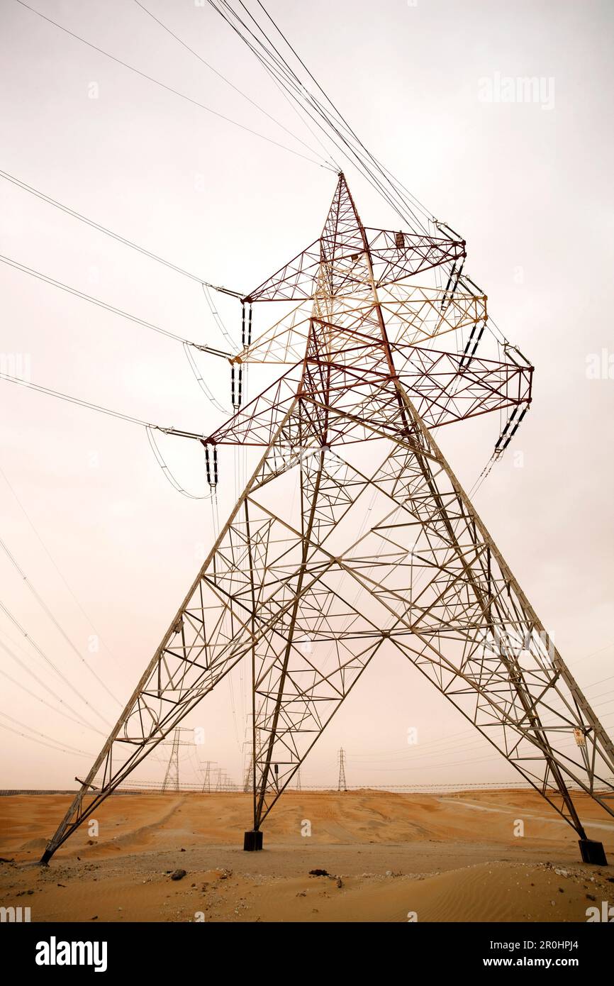 Electricity pylons in dessert, Abu Dhabi, United Arab Emirates Stock ...