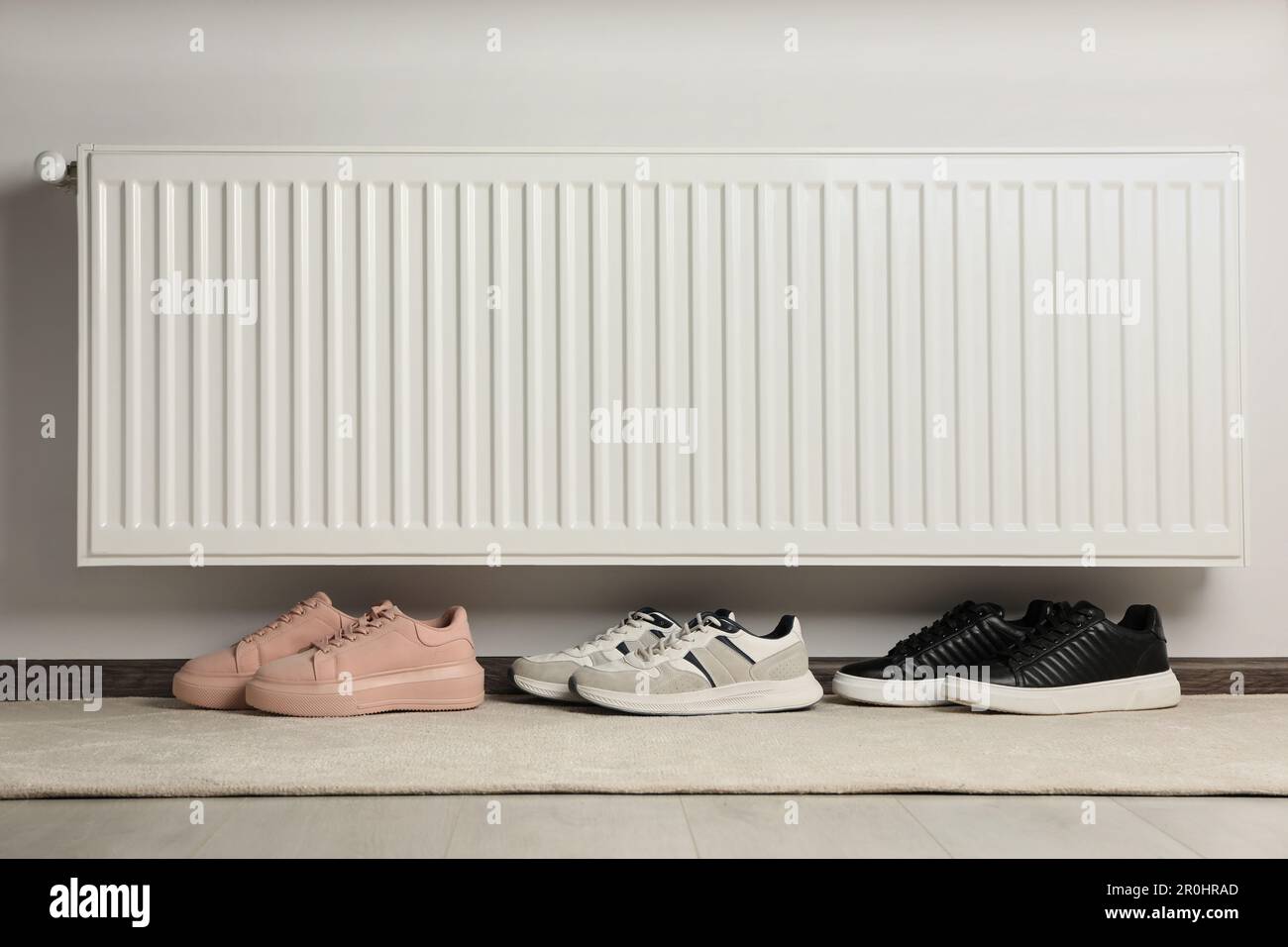 Wet shoes by heater hi-res stock photography and images - Alamy