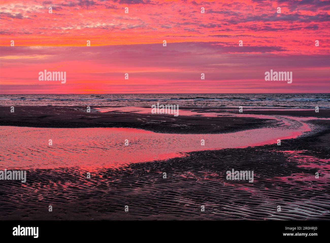 Beach at sunset, tidal channel, Juist Island, Nationalpark, North Sea ...