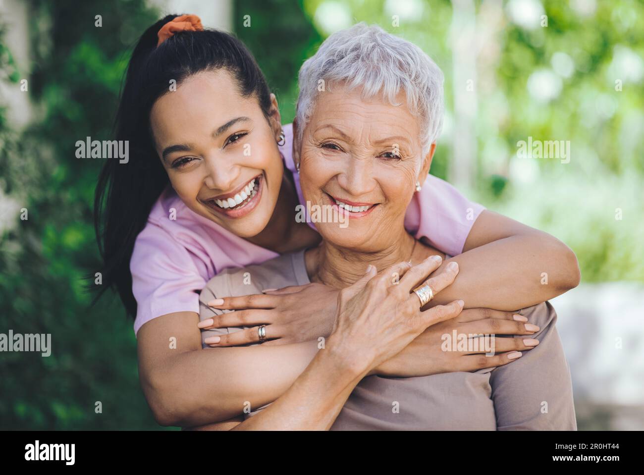 She wears her journey on her face. Portrait of a young nurse caring for ...