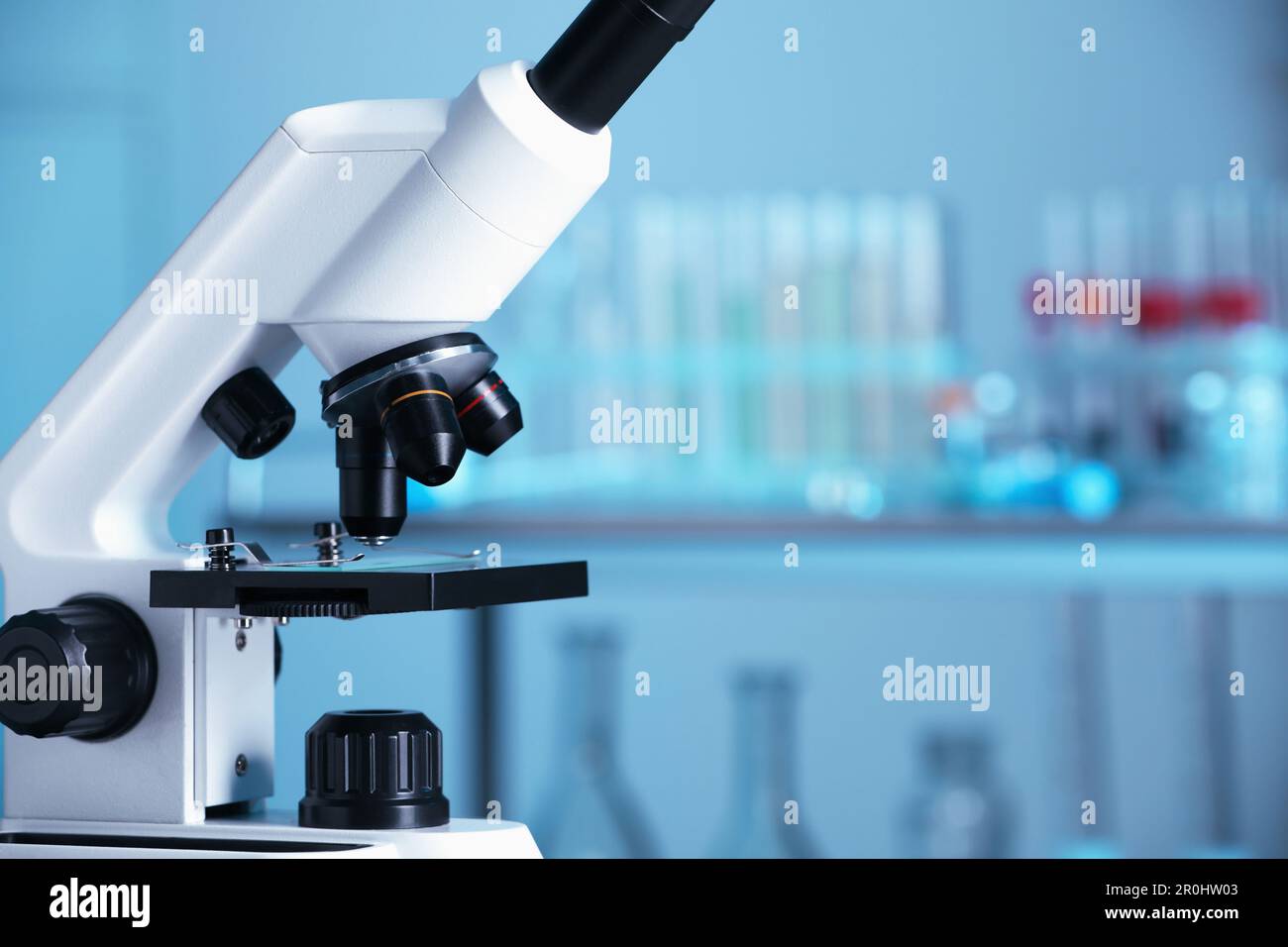 Modern medical microscope in laboratory. Space for text Stock Photo - Alamy