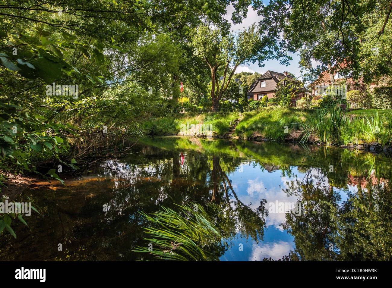 Residential houses along river Alster, Hamburg Wellingsbuettel, Germany ...