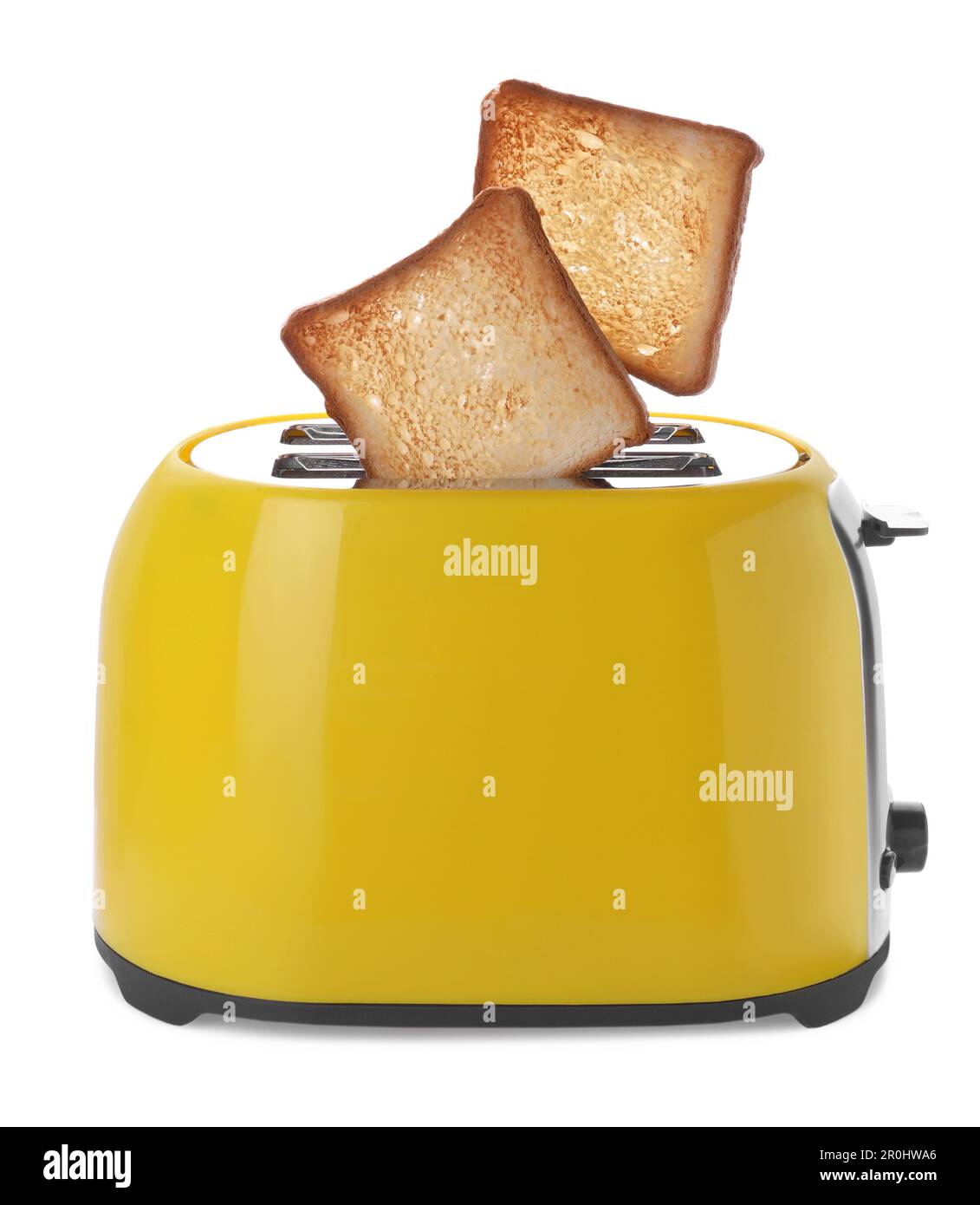 Yellow toaster with roasted bread slices on white background Stock ...