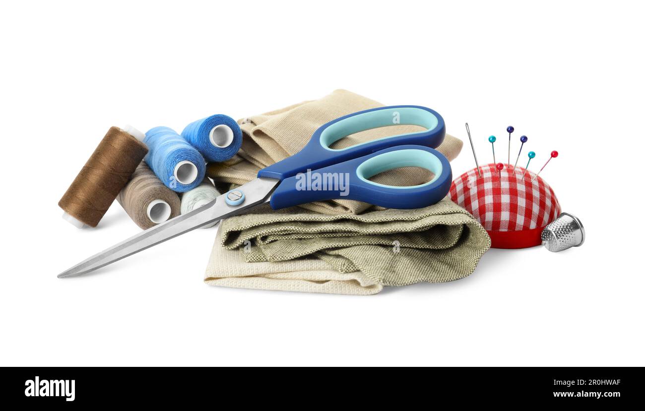 Scissors, spools of threads and sewing tools on white background Stock ...