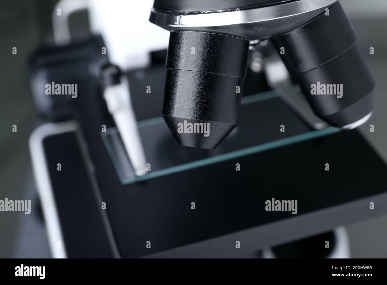 Modern medical microscope with glass slide, closeup Stock Photo - Alamy