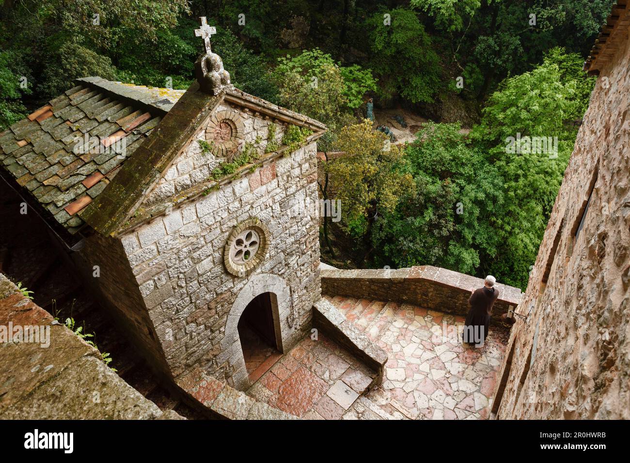 Monk at Eremo delle Carceri, chapel, hermitage above Assisi, Monte ...