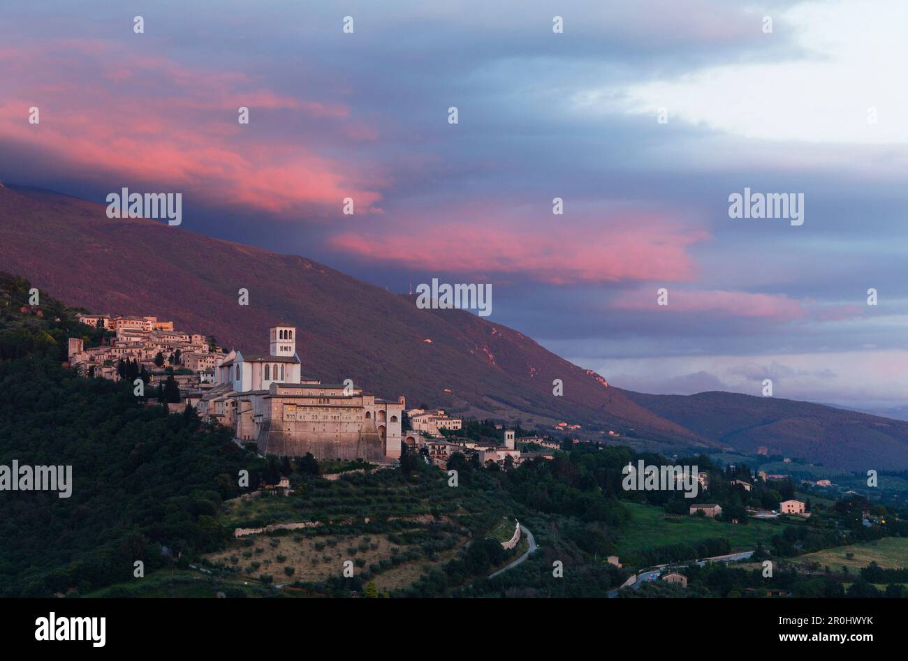 Assisi with Basilica of San Francesco d Assisi in the evening light ...
