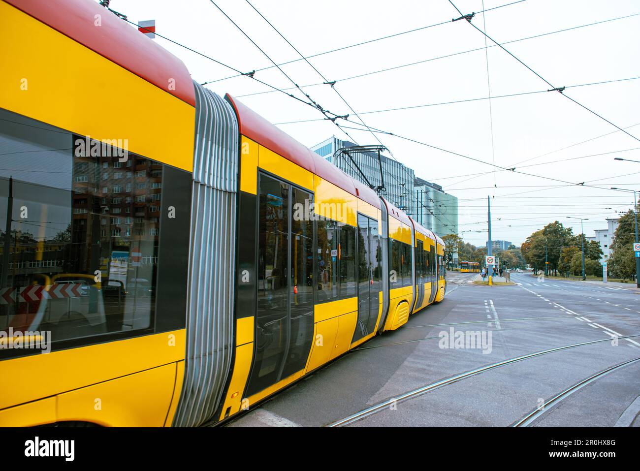 Modern tram on city street. Public transport Stock Photo - Alamy
