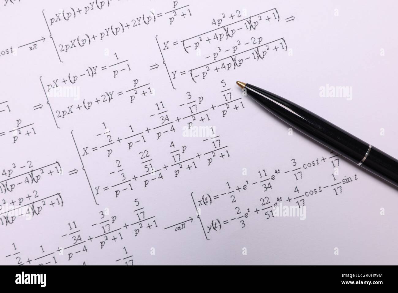 Sheet of paper with mathematical formulas and pen, top view Stock Photo ...