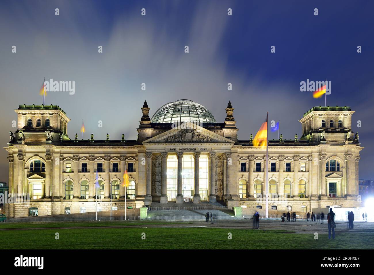 Illuminated building of German Reichstag in the evening, Berlin ...