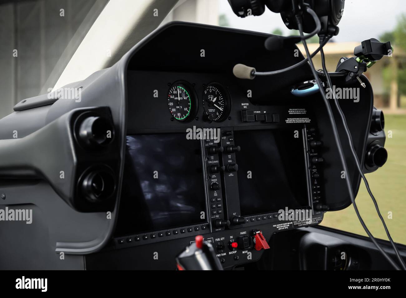 Helicopter cockpit with new modern functional panel Stock Photo - Alamy
