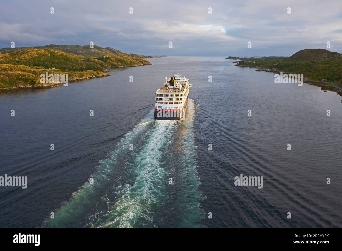 MS Midnatsol of the Hurtigruten going Sorth near Roervik, Naeroysundet ...