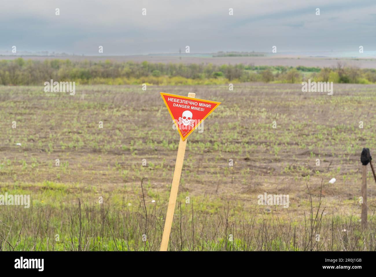Ukraine. 08th May, 2023. Warning sign about possible mines in the ...