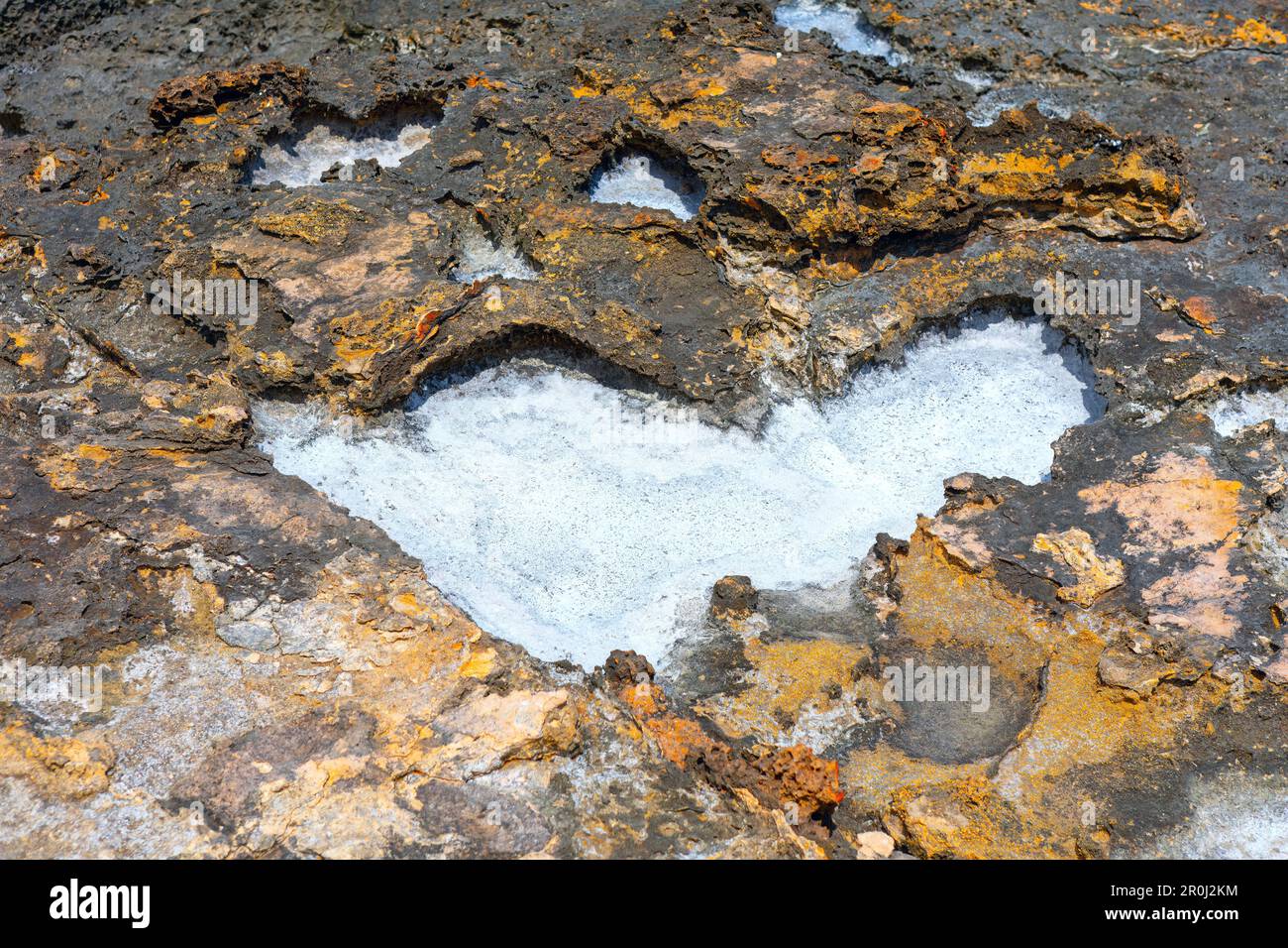 Coastal pool with salt . Salt at the coastal rocks Stock Photo - Alamy