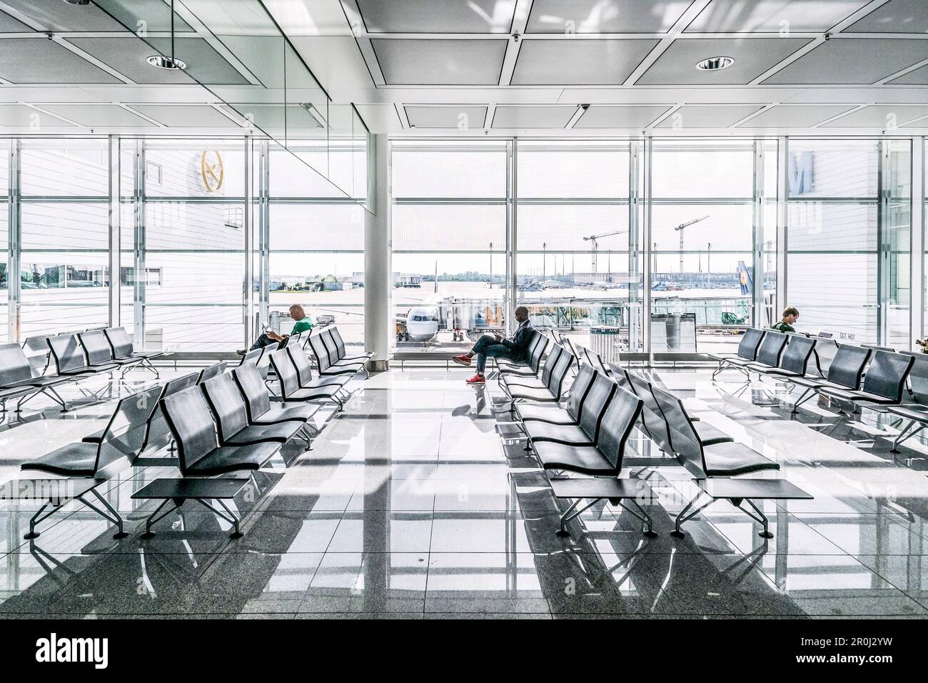 Passengers in waiting area hi-res stock photography and images - Alamy