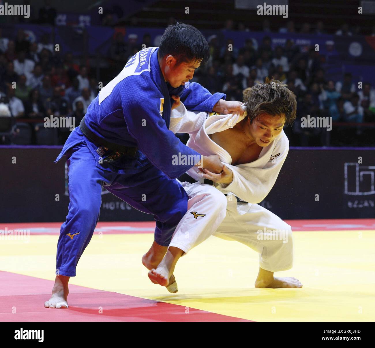 Japan's Tokyo Olympic champion Hifumi Abe (white) takes on compatriot ...