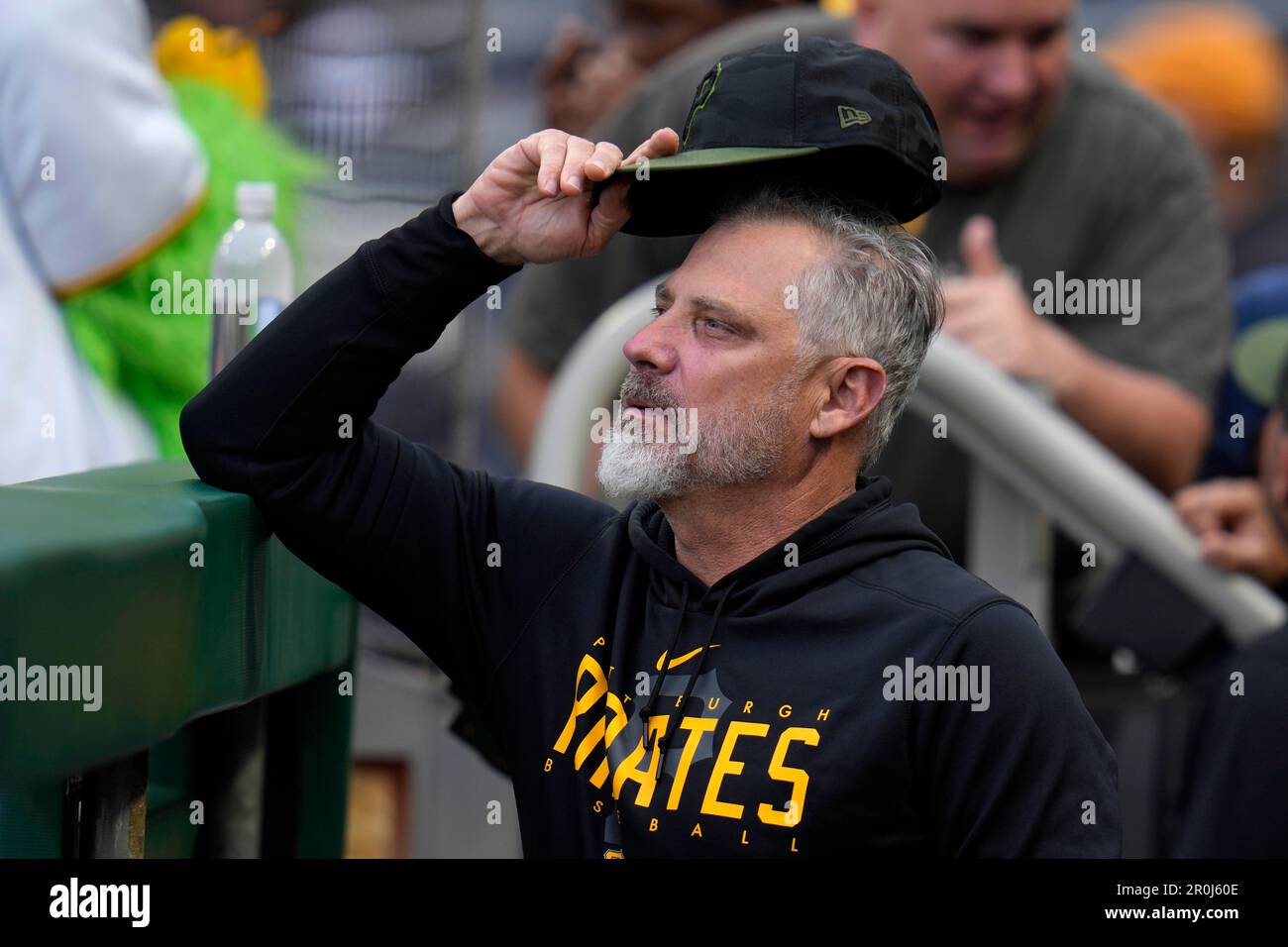 Pittsburgh Pirates manager Derek Shelton stands in the dugout before a ...