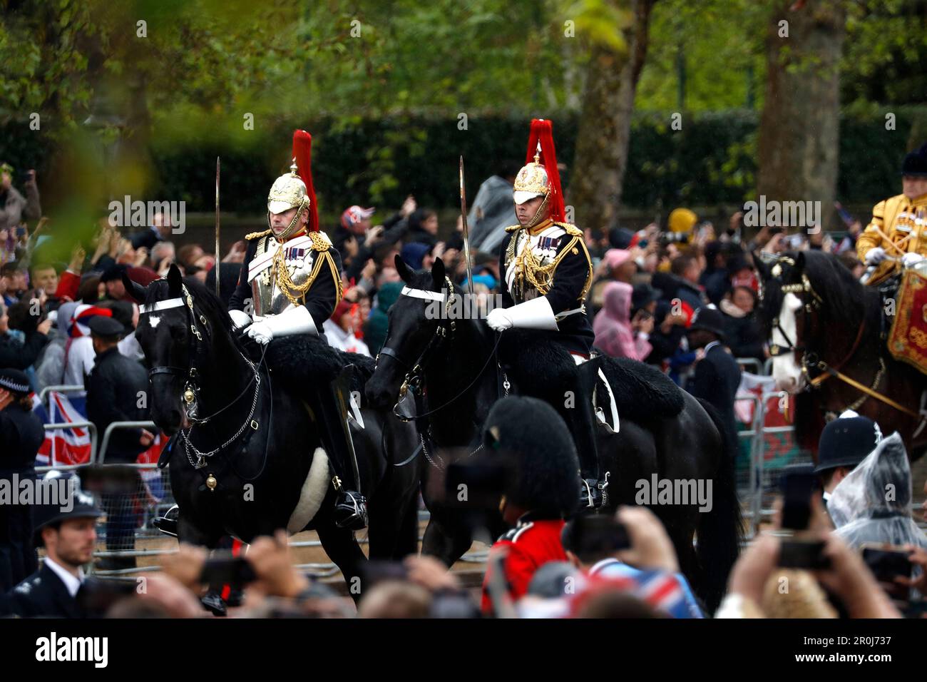 Military procession makes its way down the Mall following King Charles ...