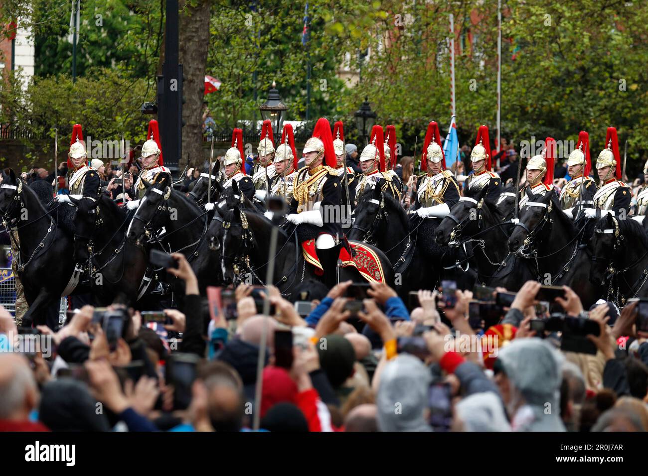 Military procession makes its way down the Mall following King Charles ...