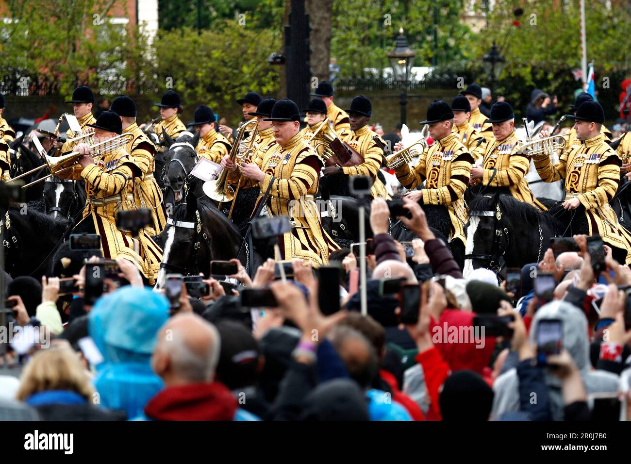 Military procession makes its way down the Mall following King Charles ...