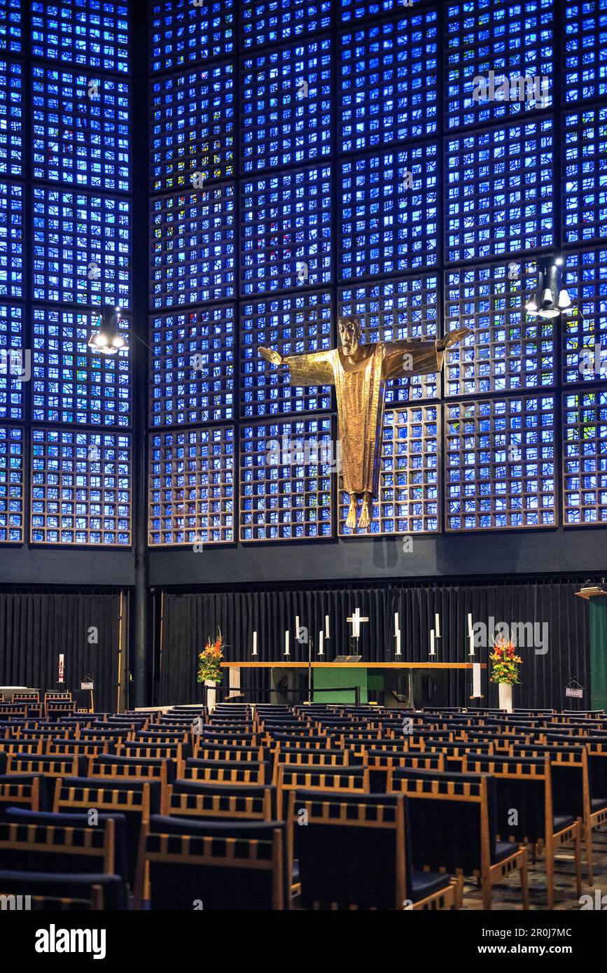 Jesus on the cross in front of the blue coloured glass facade in ...