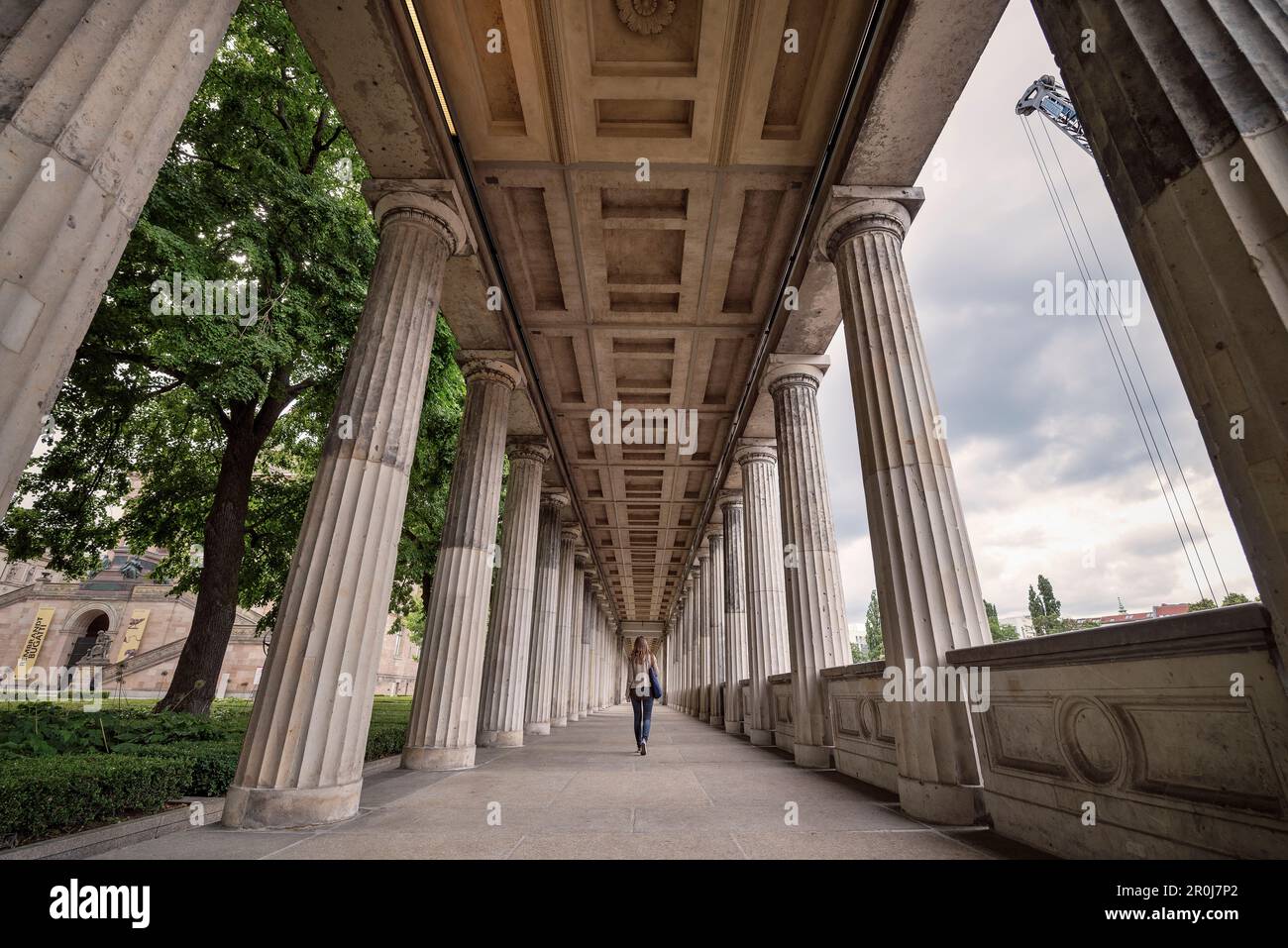 Young lady walking between the columns at the Old National Gallery ...