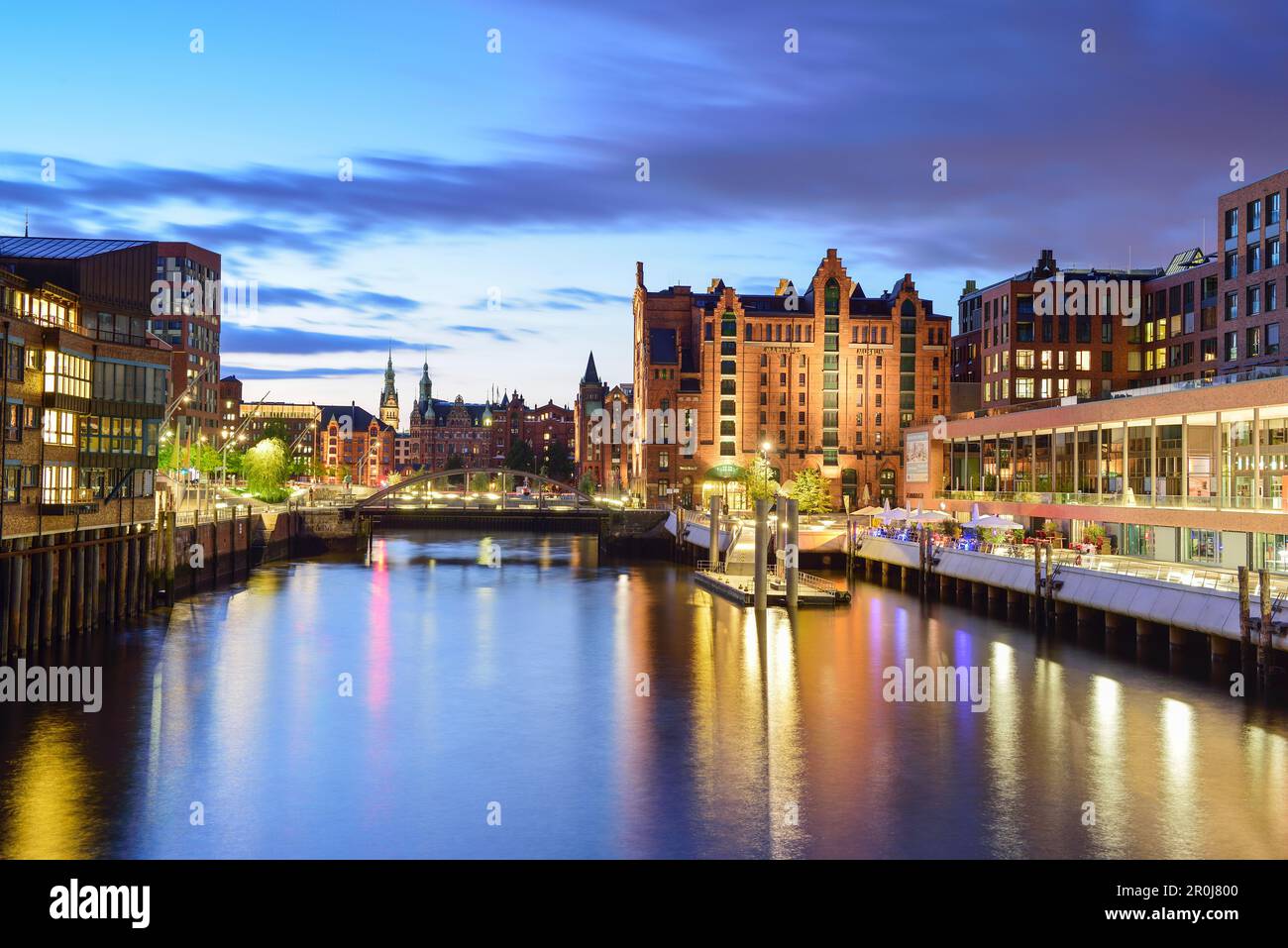 Illuminated port Magdeburger Hafen with warehouse district in the ...