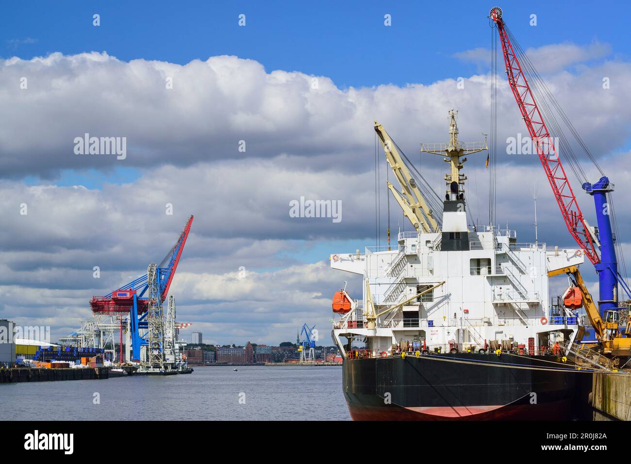 Ship docking at dock and being loaded, Waltershof, river Elbe, Hamburg ...